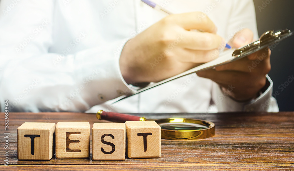 Man makes a test and writes results to a clipboard. Quality control ...