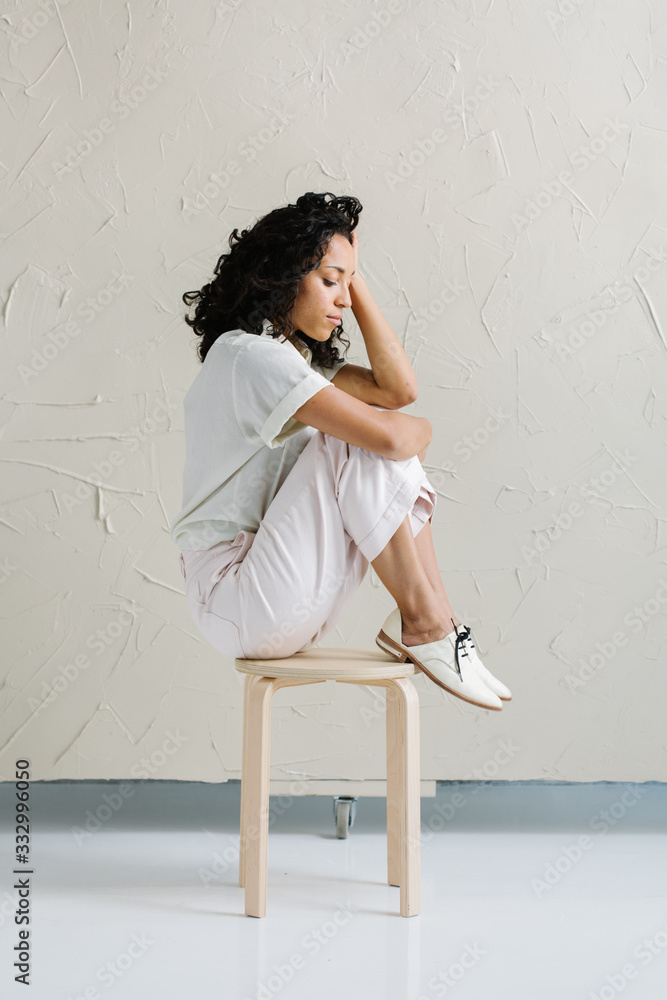 Mixed Girl on Neutral Background Stock Photo | Adobe Stock