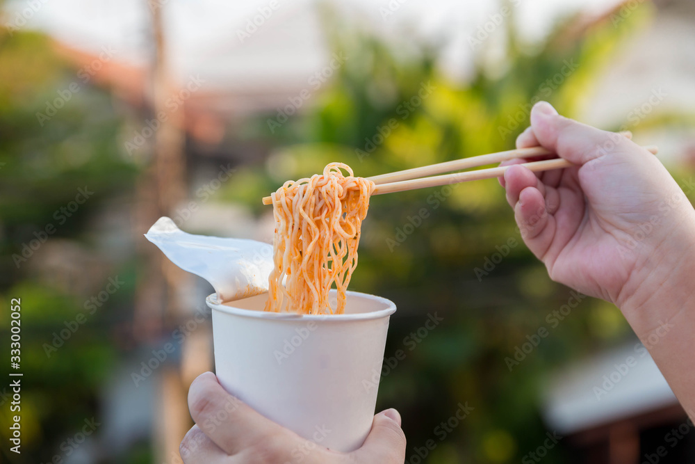 Hot noodle Cup. Noodle cup Ready made. Eating Instant Noodles with a ...