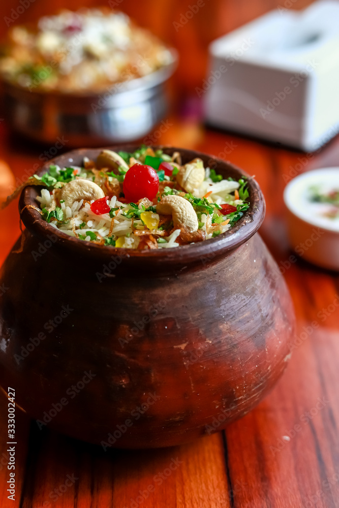 Veg Matka Biryani (Biryani made in earthen pot) Stock Photo | Adobe Stock