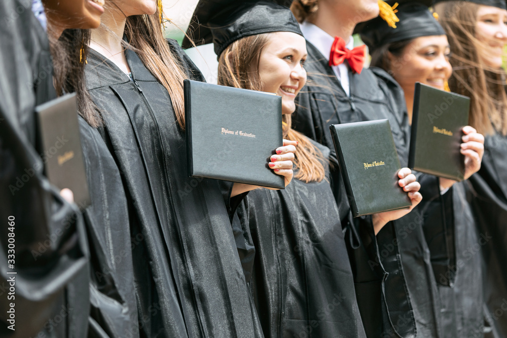 Grad: Group Of Graduate Friends Pose With Diplomas Stock Photo | Adobe ...