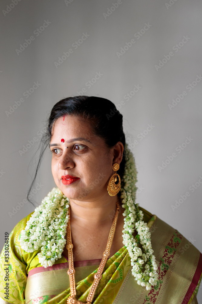 Portrait of beautiful Indian Tamil Woman in traditional south indian ...