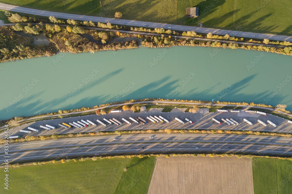 Top down aerial view of highway interstate road with fast moving ...