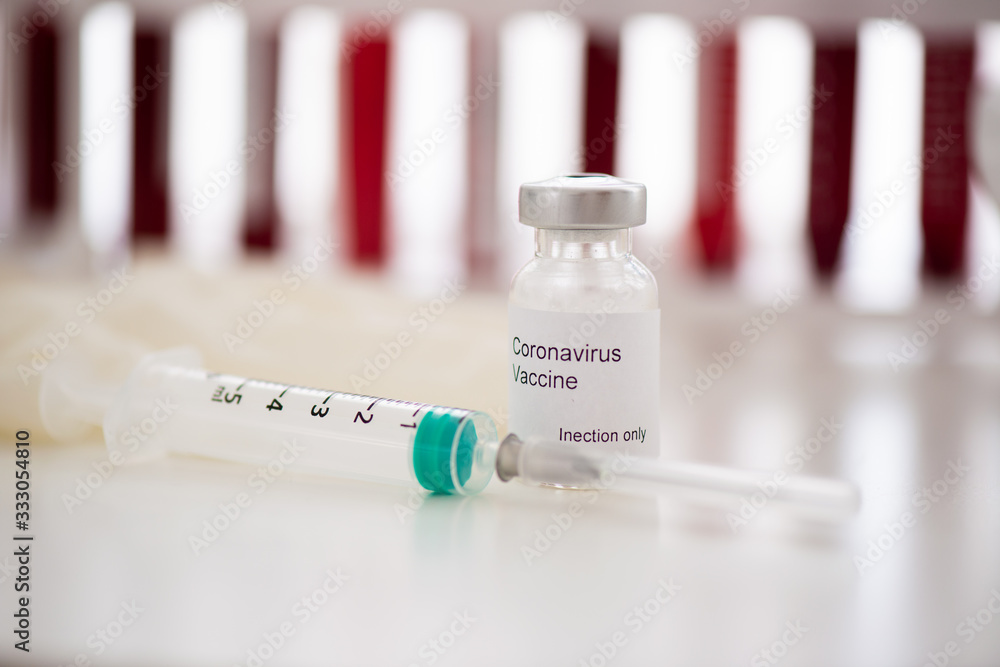 Test tubes with blood sample Covid-19 coronavirus. Vaccine and syringe ...