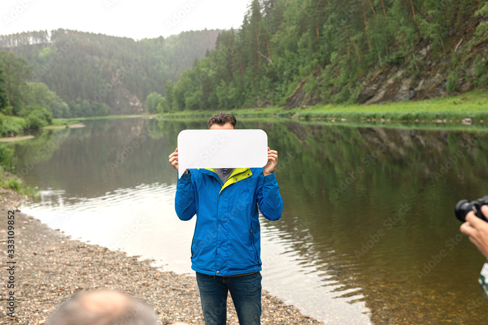 Work of photographer with model in outdoor. Photographers taking shot ...