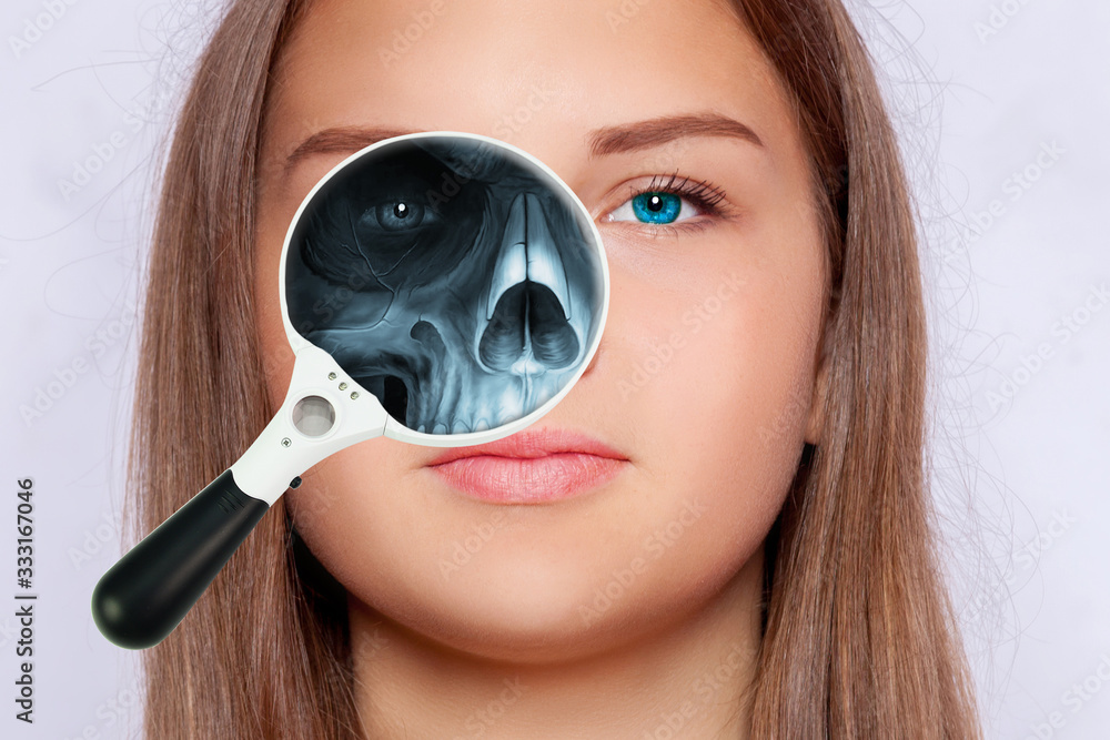 X-ray with a magnifying glass from the face part of a human, the human ...