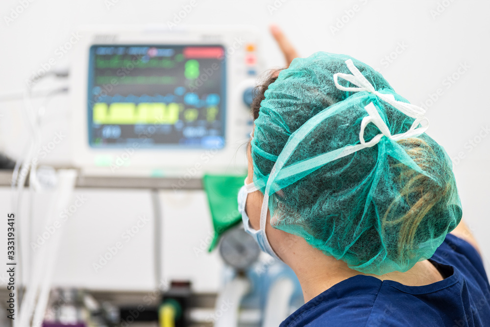 Covid-19 outbreak. Healthcare worker. Nurse working in intensive care ...
