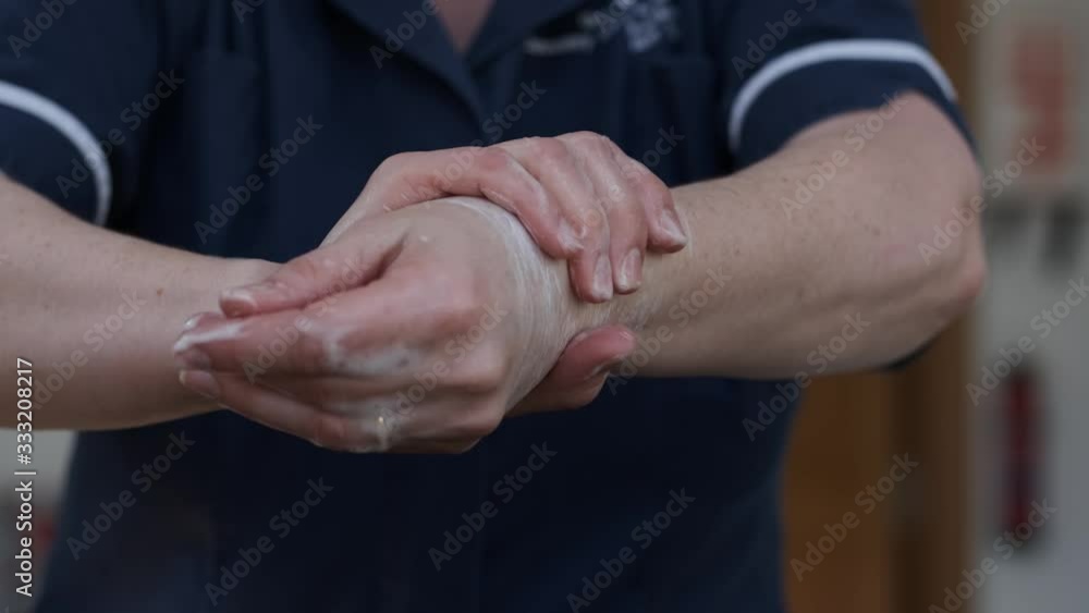Washing Hands NHS Nurse Demonstration Technique Rub Both Wrists In A ...
