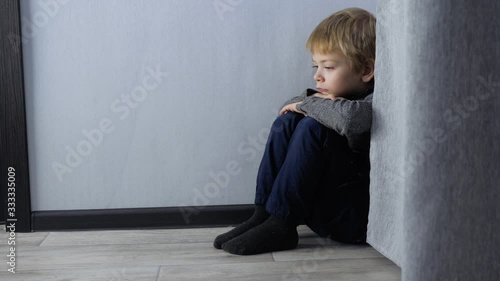 sad guy crying in corner