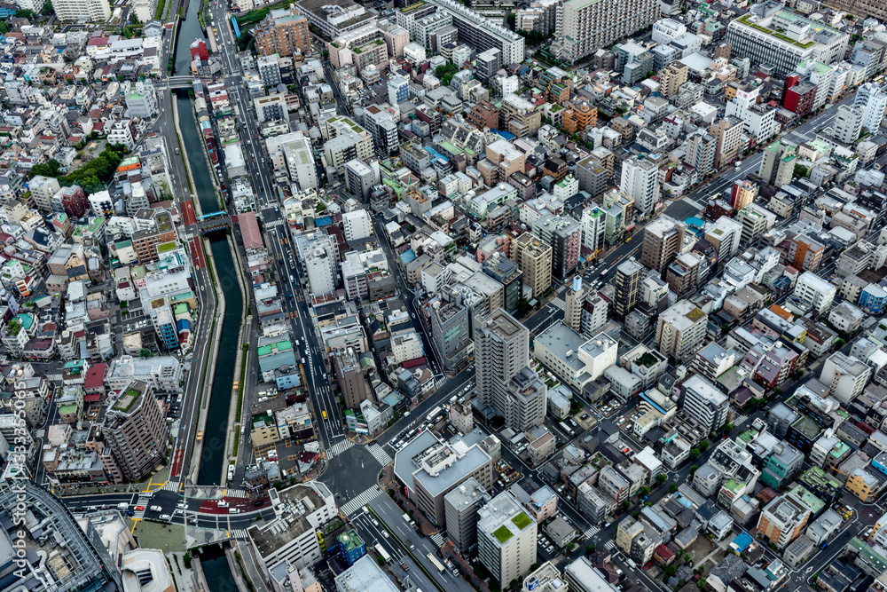 Urban Metropolitan Cityscape in Tokyo, Japan with busy skyline and ...