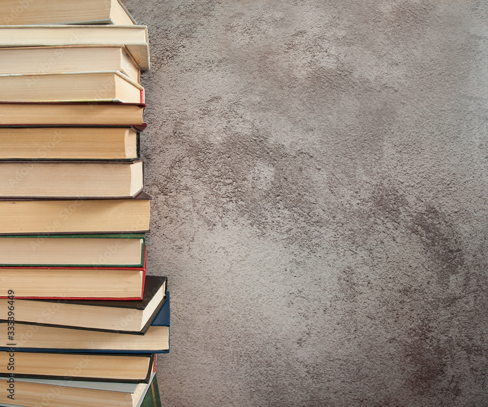 Time for yourself, the pleasure of reading. A vertical stack of books ...