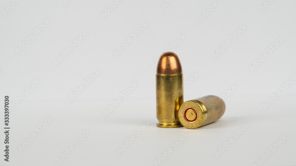 Ammunition of the handgun. bullet .45 acp. on a white background Stock Photo | Adobe Stock