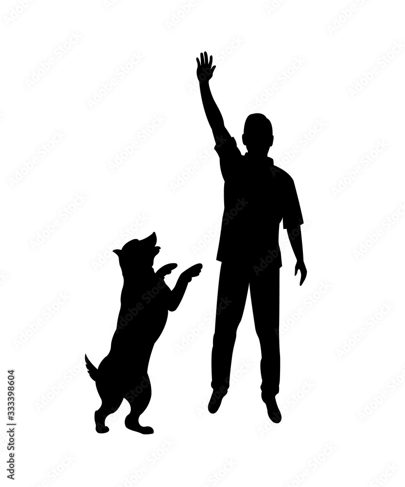 Silhouette man and dog. A man stands with his hand raised, the dog ... Silhouette man and dog. A man stands with his hand raised, the dog ...