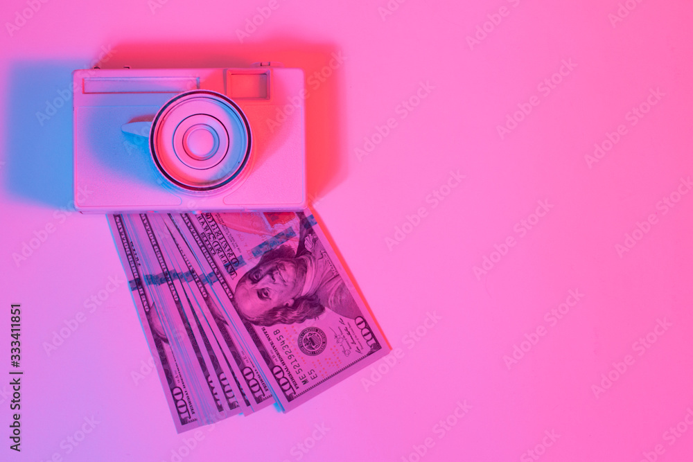 Vintage camera and money in vibrant bold gradient purple and blue ...