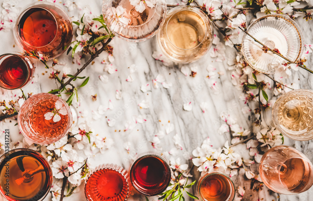 Shades of rose wine. Flat-lay of rose wine of different colors in ...
