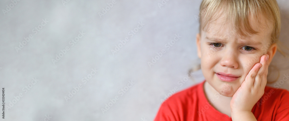 kid crying. the face of a cute little upset four year old baby boy in ...