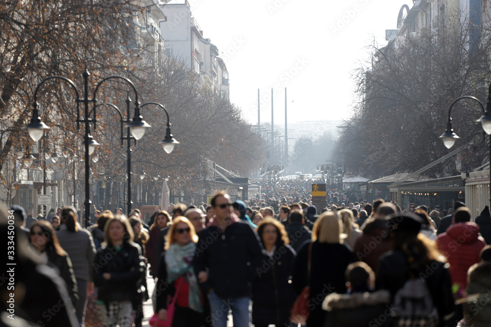Huge crowd of people outdoor. A huge mass of unrecognizable people in ...