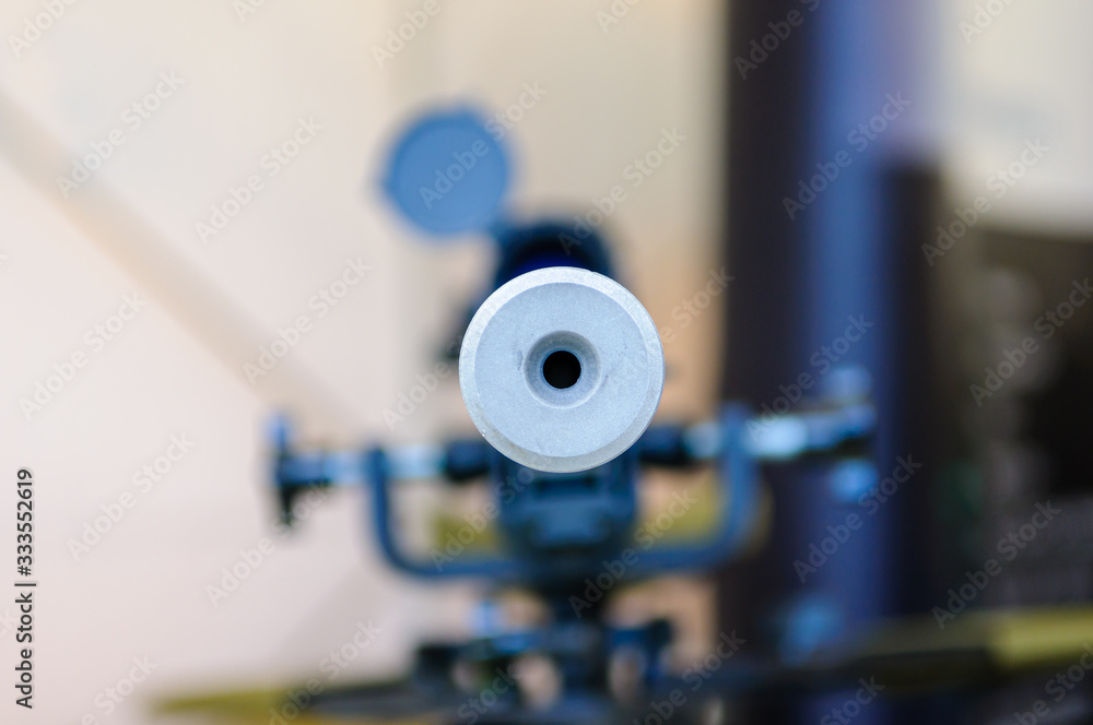Muzzle of a sniper rifle. Stock Photo | Adobe Stock
