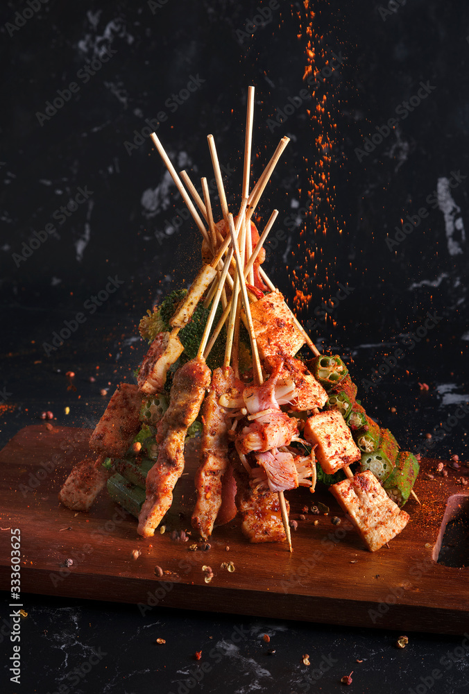 Mala grilled barbecue (BBQ) with Sichuan pepper, with falling ...