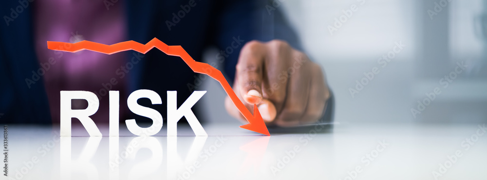 Person Pointing Diminishing Arrow Over The Risk Stock Photo | Adobe Stock