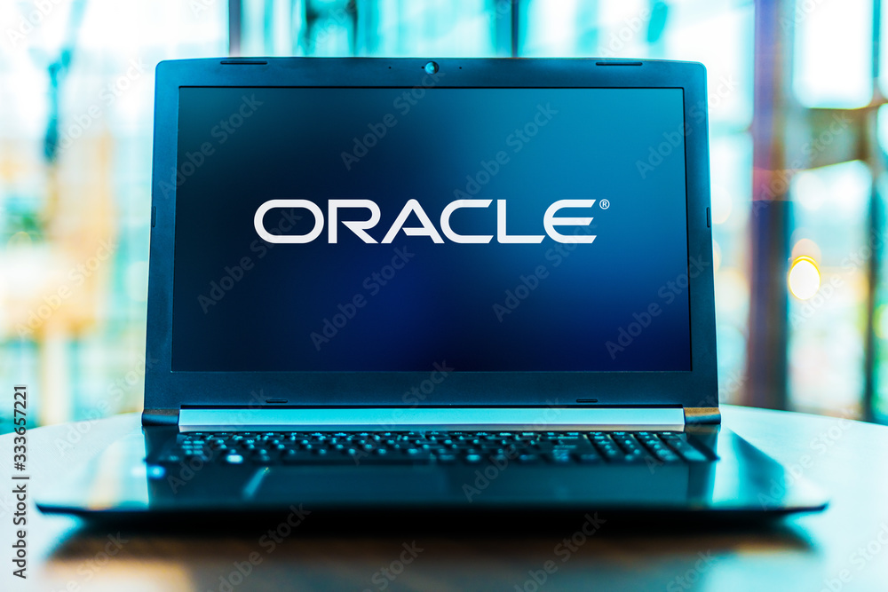 Laptop computer displaying logo of Oracle Corporation Stock Photo ...