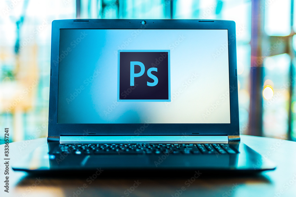 Laptop computer displaying logo of Adobe Photoshop Stock Photo | Adobe ...