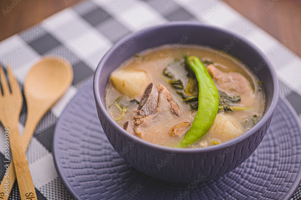 Sinigang is a Filipino dish famous for its sour and sometimes spicy ...