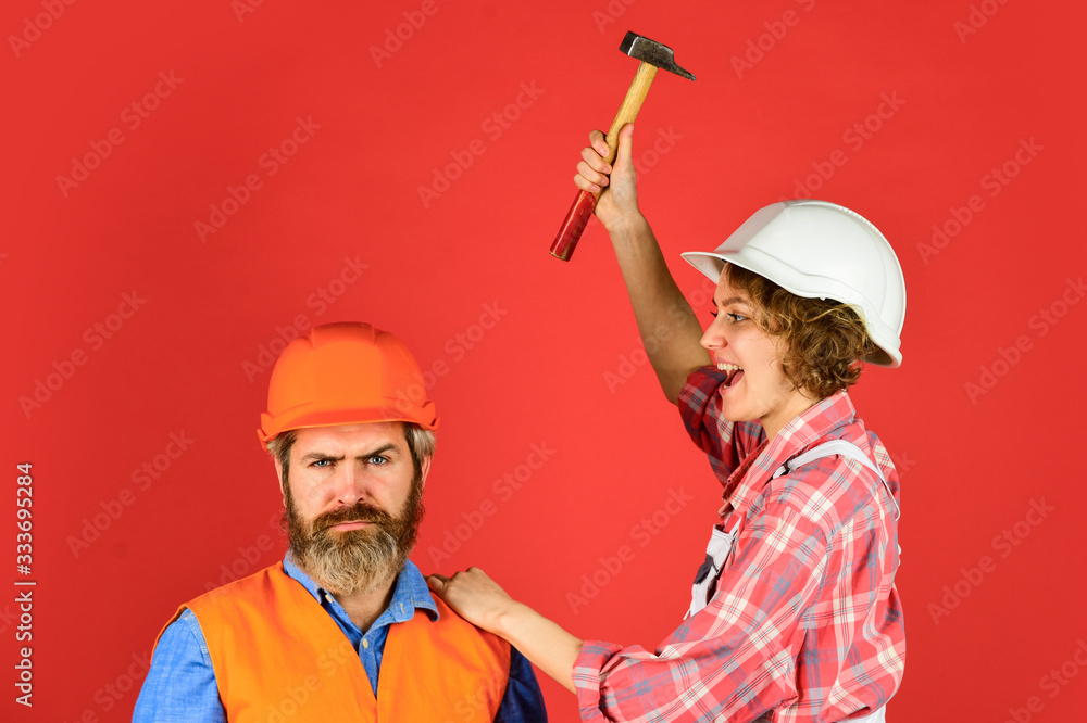 Couple knocking head with hammer. Clearly explain. Intelligibly concept ...