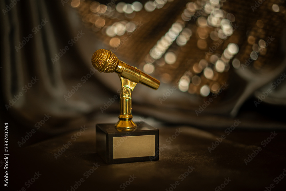 Gold, metallic microphone, mike statuette, figurine medal award for ...
