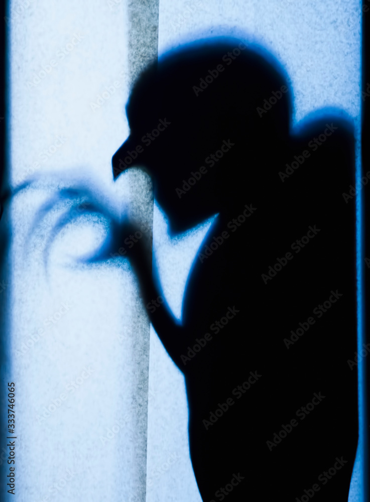 Conceptual psychological image of silhouette of monster as symbol of ...