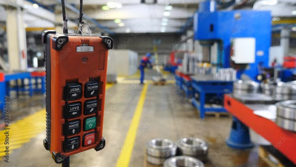 Control console of lifting crane for heavy details shot on factory ...