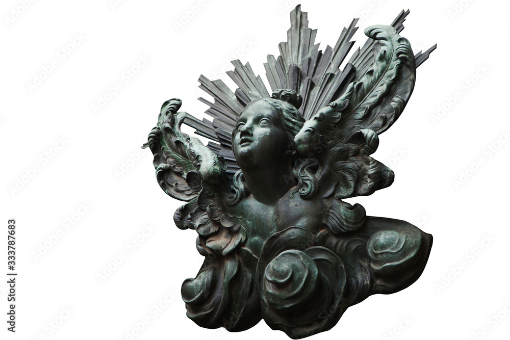 An ancient iron statue of angel in the light. Isolated on white ...