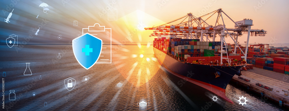 Container ship in the international terminal yard port at sunrise ...