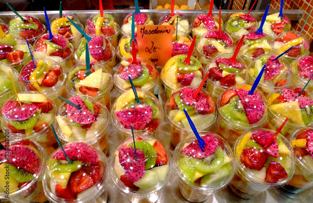 fruit cups of freshly sliced fruit mixture in plastic cups with lid and ...