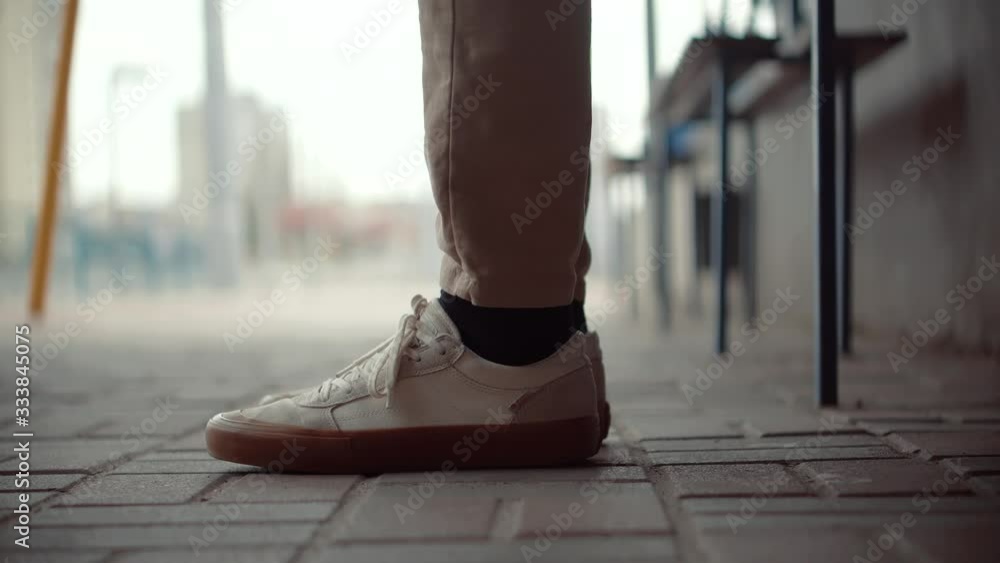 Travel Man Sitting On Bench Tram Station And Moving Legs.Businessman ...