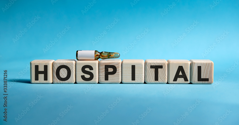 HOSPITAL - word on cubes. Drug in ambula to reduce disease symptoms on ...