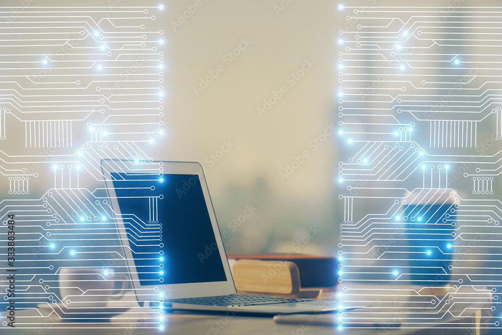 Computer on desktop in office with technology theme hologram. Multi ...
