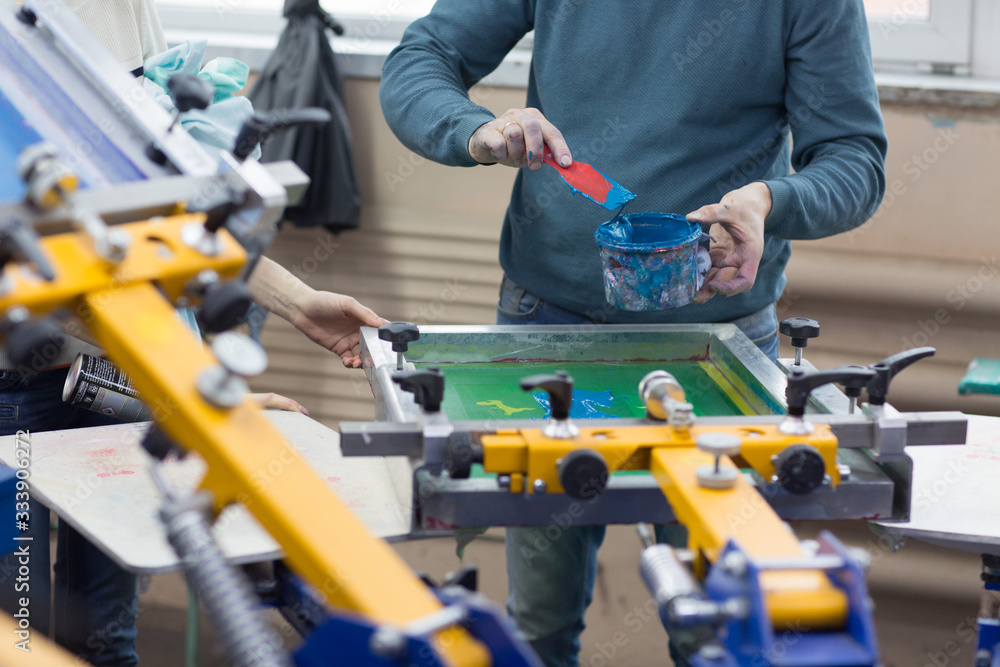 Silk screen printing. Serigraphy. Color paints and fabric. Carousel ...