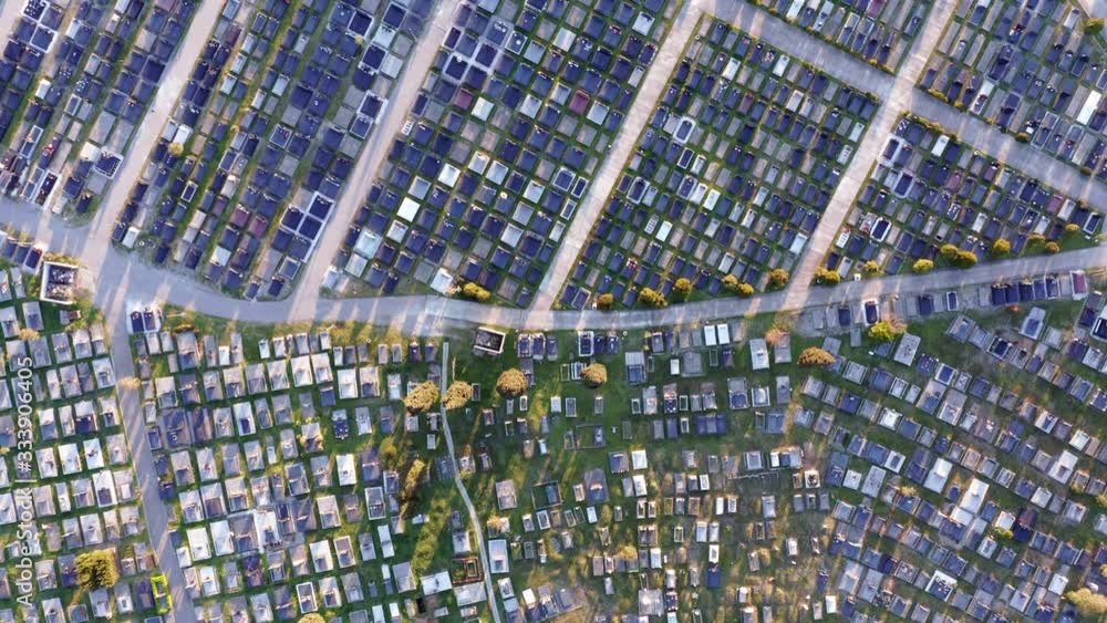 Wideo Stock: Large cemetery with grid layout - top down view. Alleys ...
