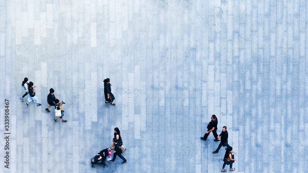 op view of social distance people are walking in public space on ...