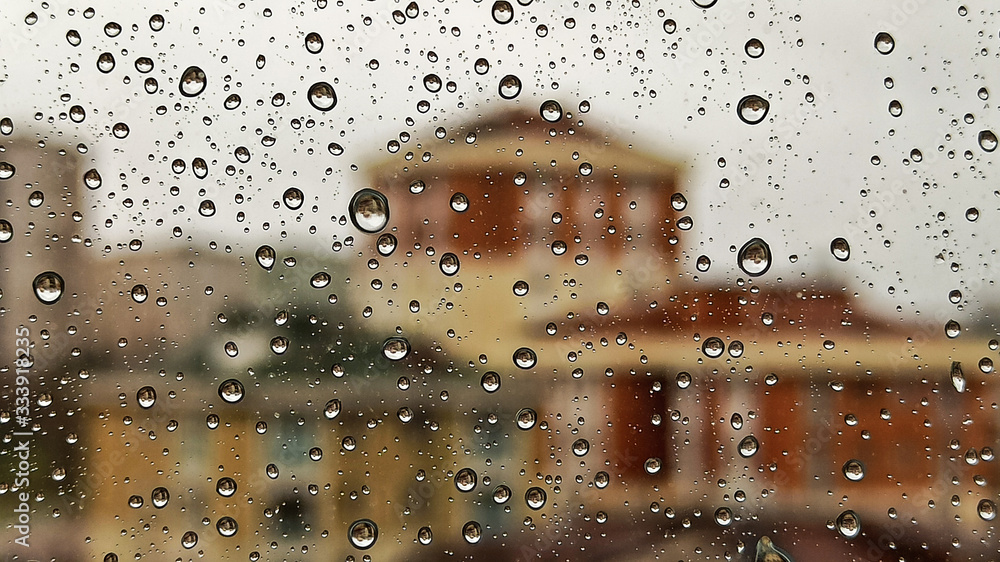 Raindrops on office window with blur grey sky background. Office window ...