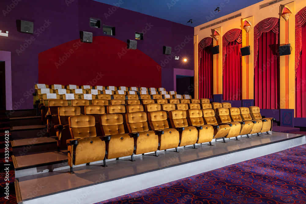 Poster Large cinema theater interior with seat rows for audience to sit ...