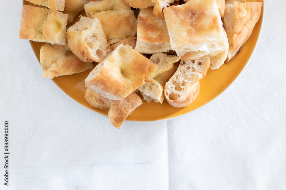 Italian pizza bread chopped for party finger food. Salami, prosciutto ...