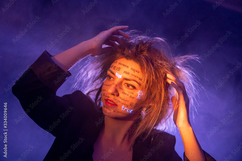 Girl with Disheveled Hair in Dramatic Purple light with written ...