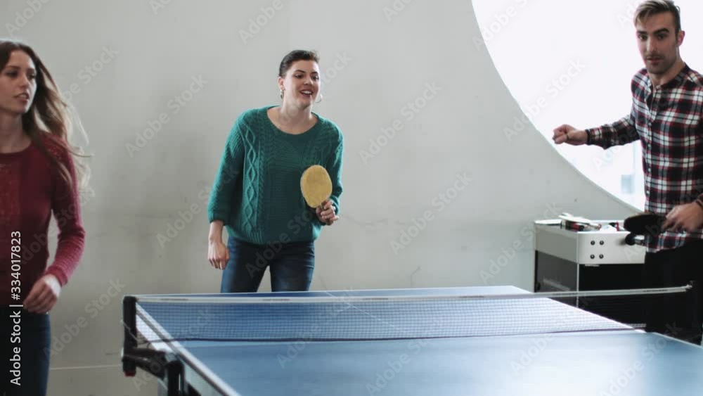 adult group playing table tennis in office Stock Video | Adobe Stock
