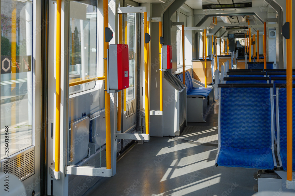 Interior view of a corridor inside passenger trains with blue fabric ...