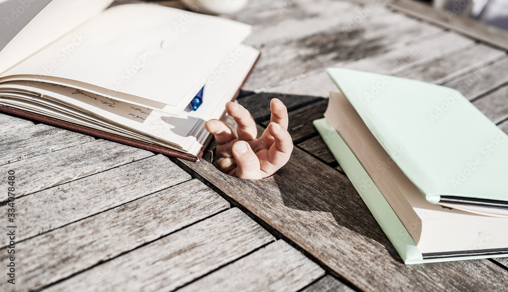 Suppressed child creativity concept. Child hand reaching towards the ...