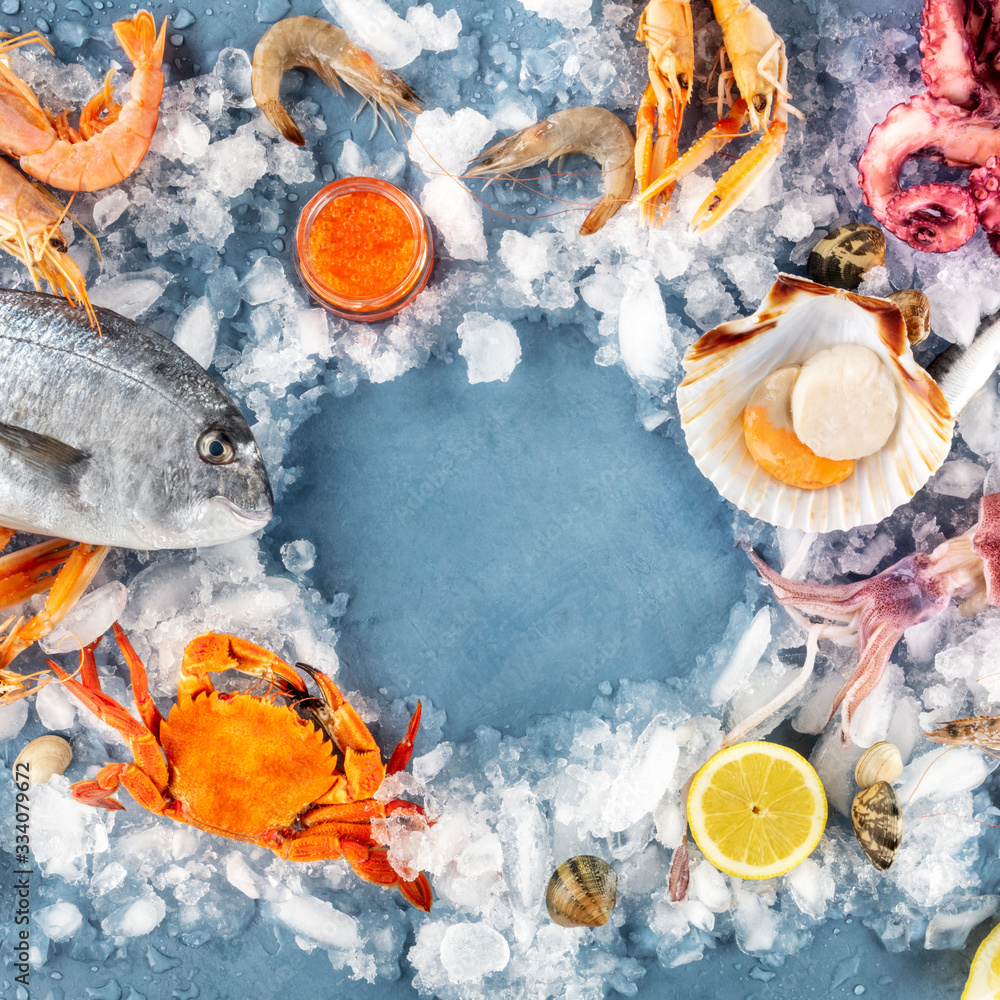 Fish and seafood background with a frame for copy space, a square ...