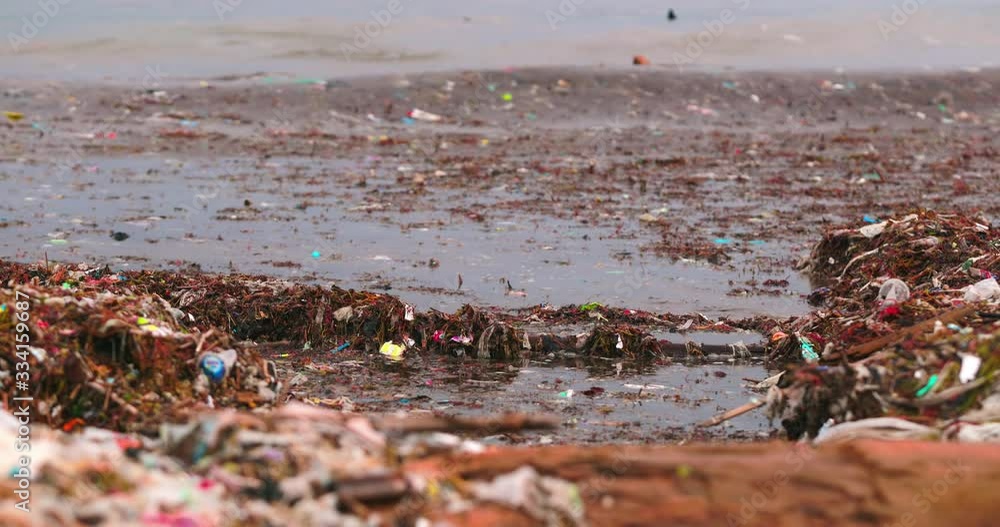 The worlds most polluted beach in Bali. Plastic bags bottles and paper ...