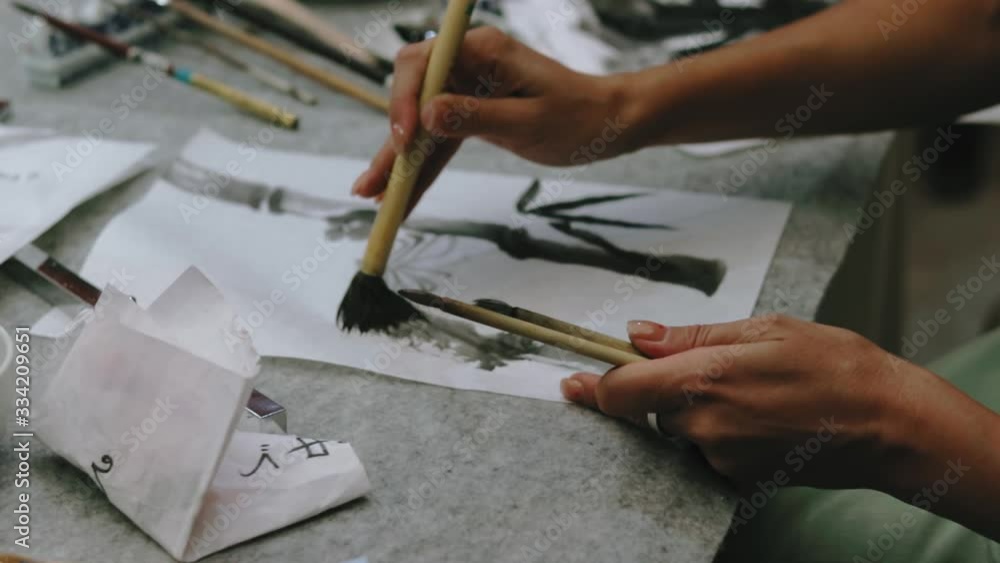 Women hands painting bamboo Japanese style. Traditional Japanese ...